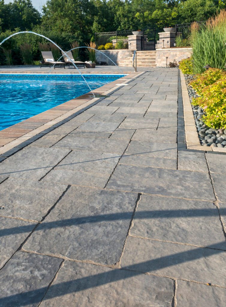 Unilock Bristol Valley Pool Patio with Brussels Fullnose Coping - Astro ...