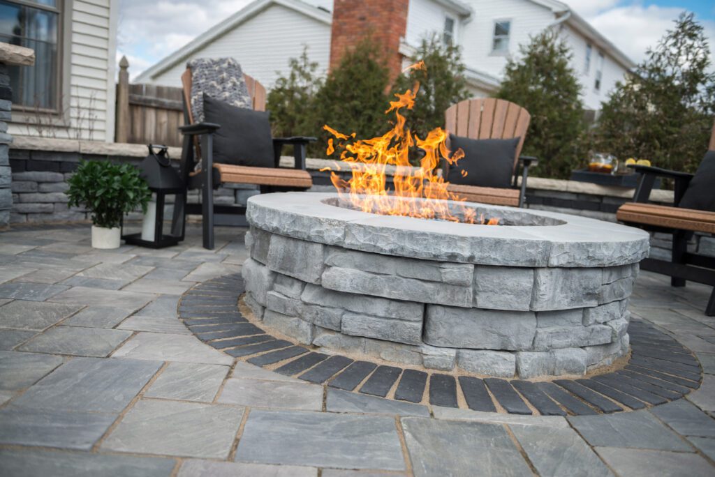 Unilock Rivercrest Fire Pit in Coast Slate - Astro Masonry, Long Island, NY
